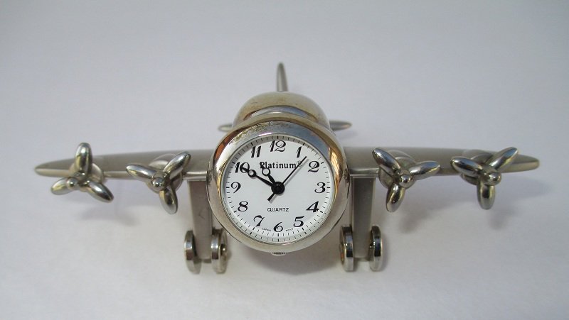 WWII Airplane Clock, 4 Propellers Spin, Wheels Move